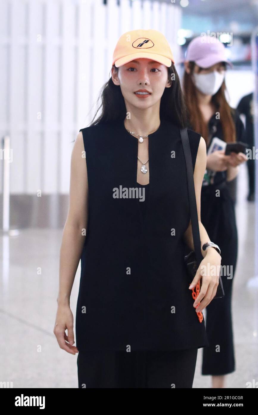 Chinese actress and singer Jenny Zhang appeared at airport in Beijing ...