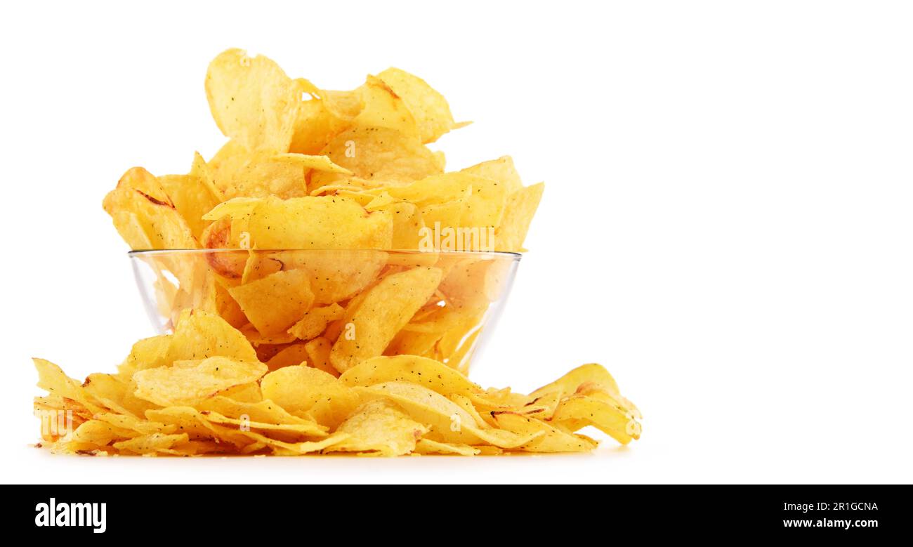 Composition with bowl of potato chips isolated on white Stock Photo - Alamy