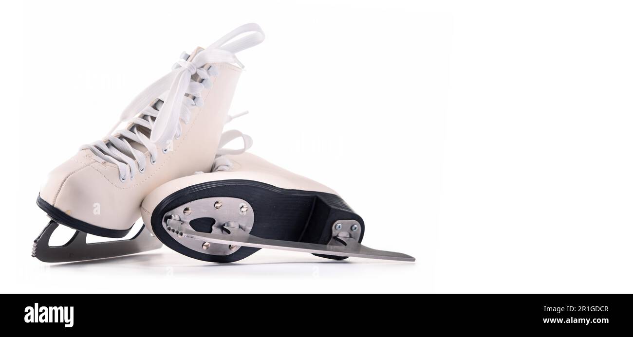 Pair of figure skates isolated on white background Stock Photo - Alamy