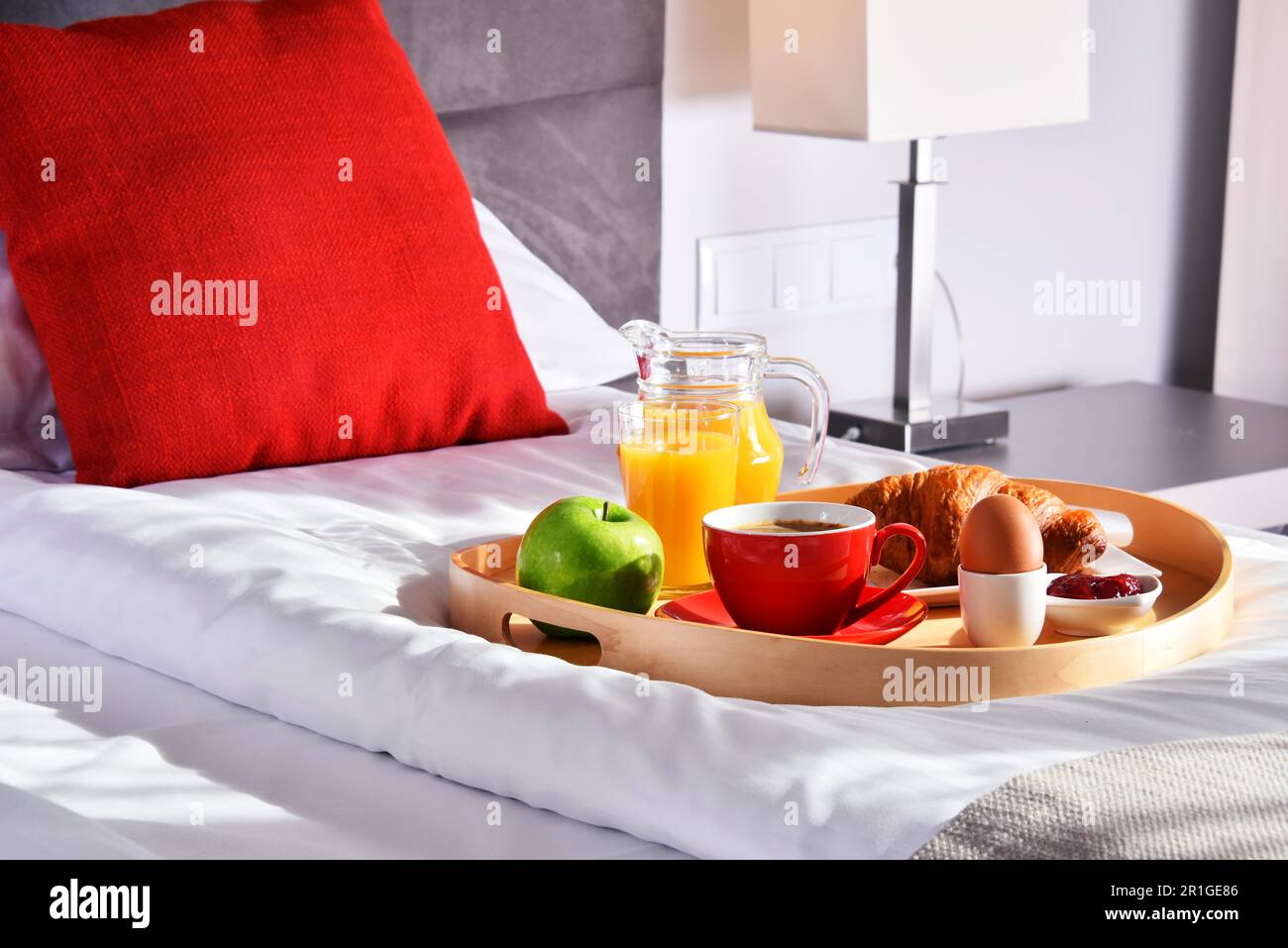 Breakfast on tray in bed in hotel room Stock Photo - Alamy