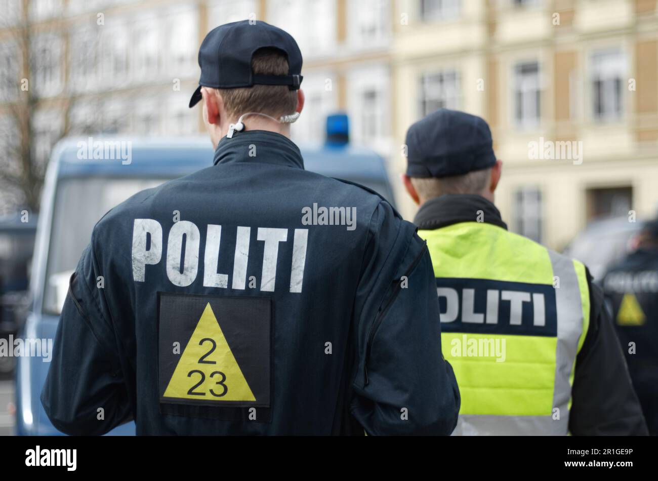 Law enforcement, guard and security with police officer in city for ...