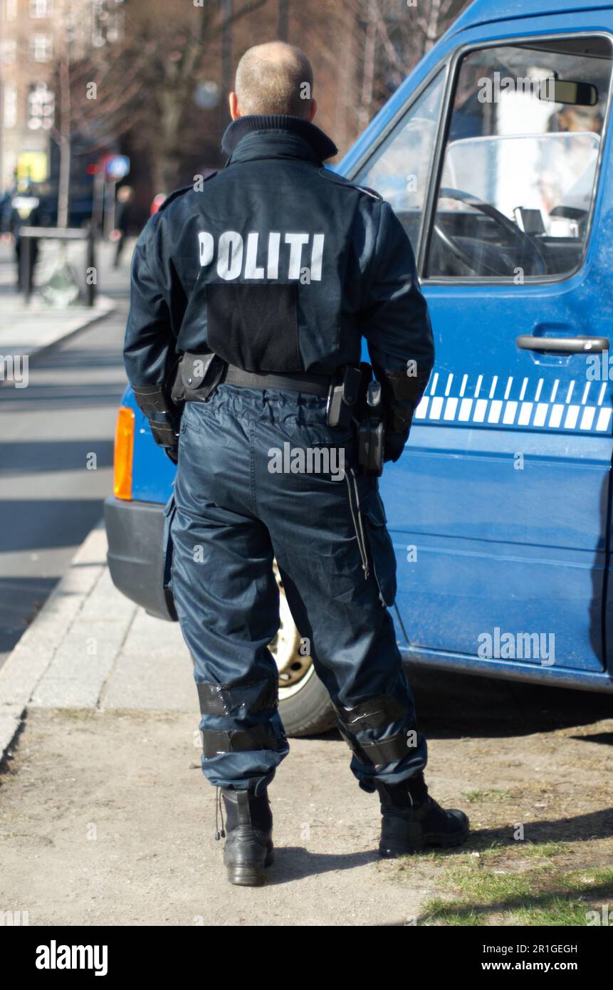 Police man, van and security in the city of Denmark for street safety ...