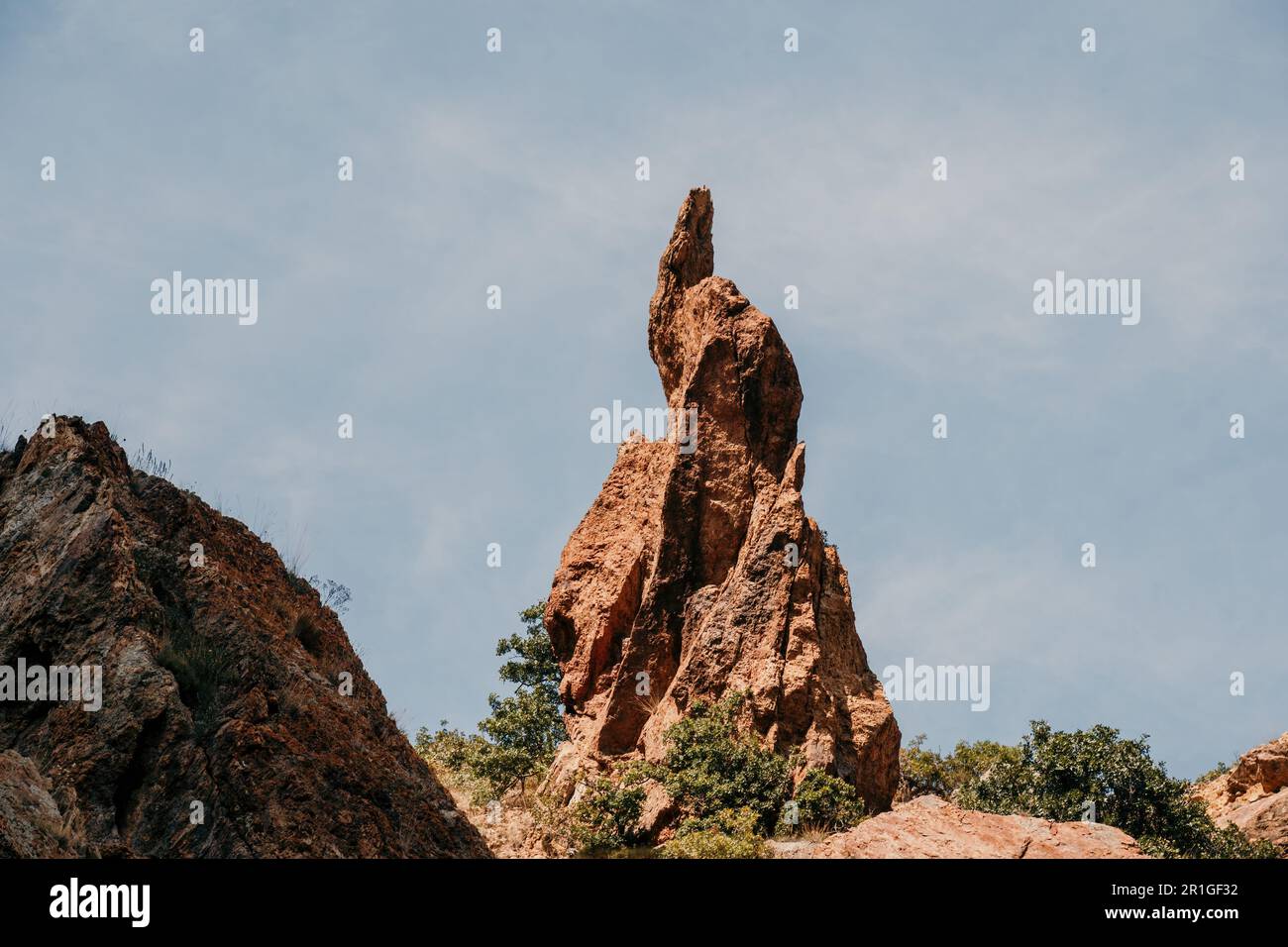 A close up of rocks that look like the beak of a bird or a sharp nose ...