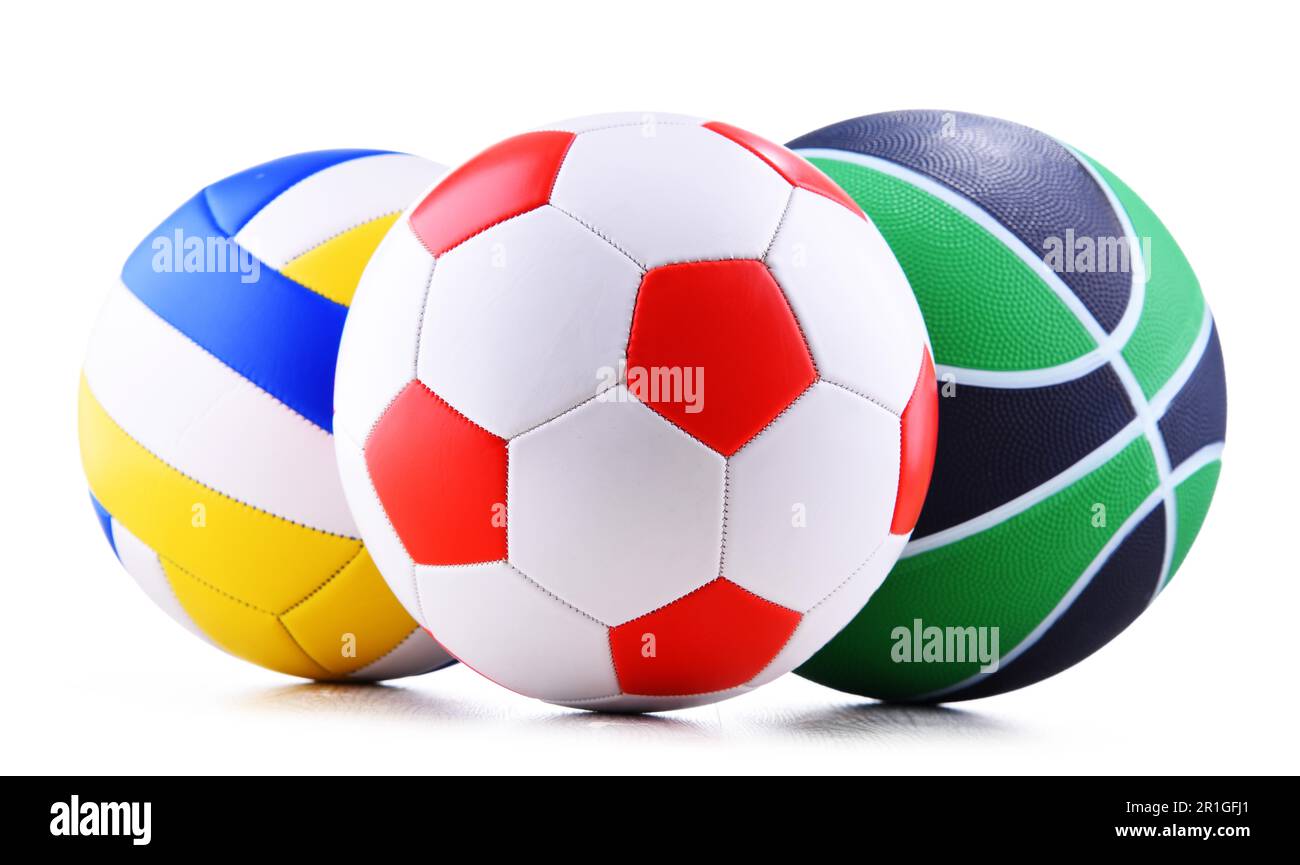 Three sport balls over white background Stock Photo - Alamy