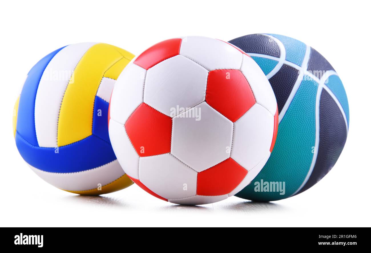 Three sport balls over white background Stock Photo - Alamy
