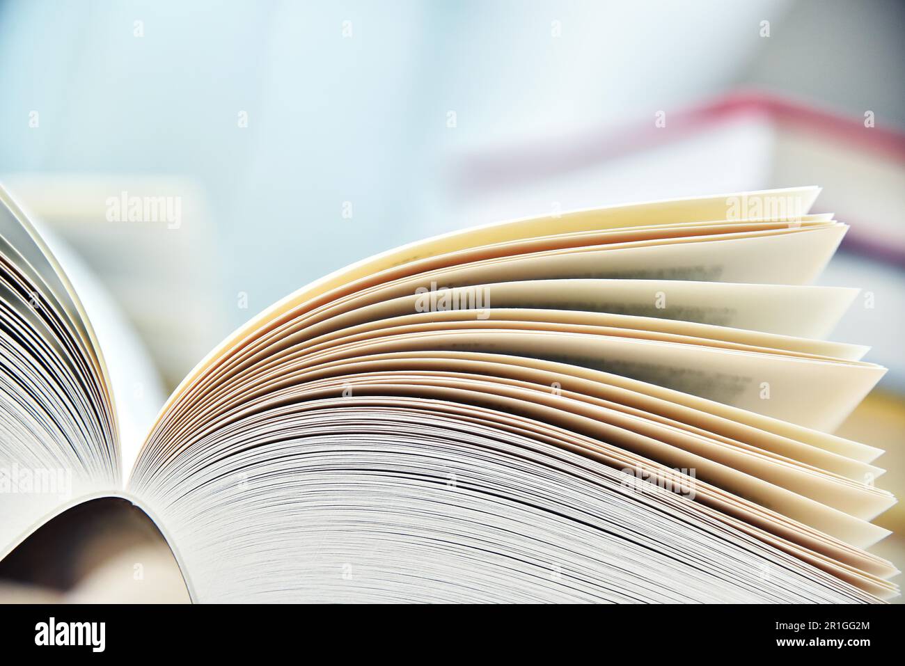 Books lying on the table in the public library Stock Photo - Alamy
