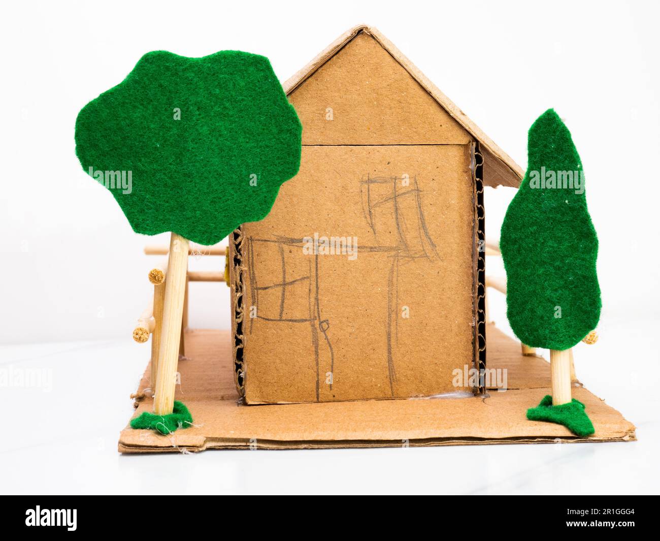 Front view of a house that made from used brown cardboard Stock Photo ...