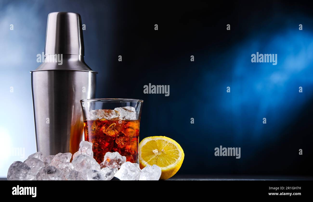 Composition with an alcoholic drink and a cocktail shaker Stock Photo ...
