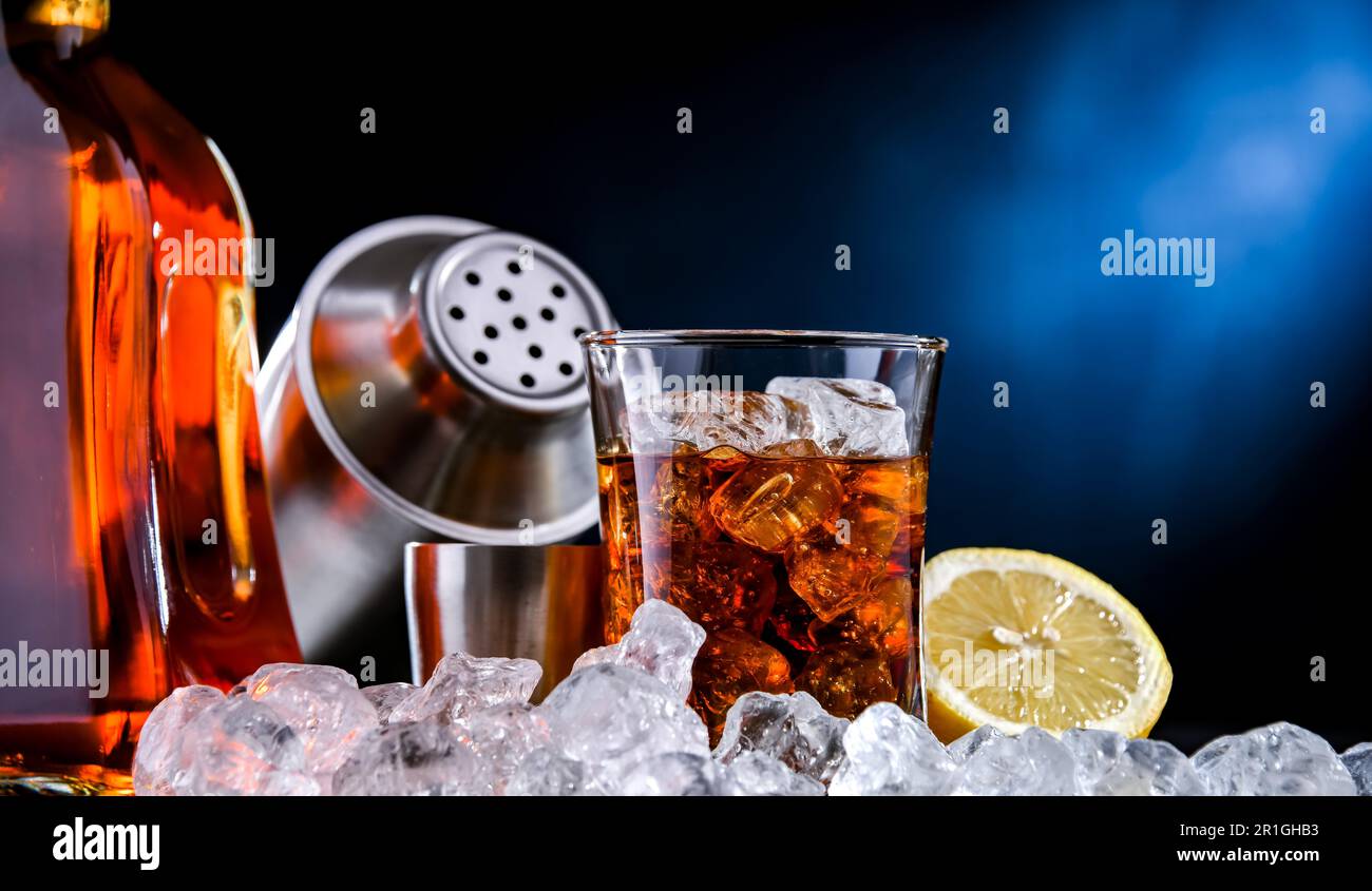 Composition with an alcoholic drink and a cocktail shaker Stock Photo ...