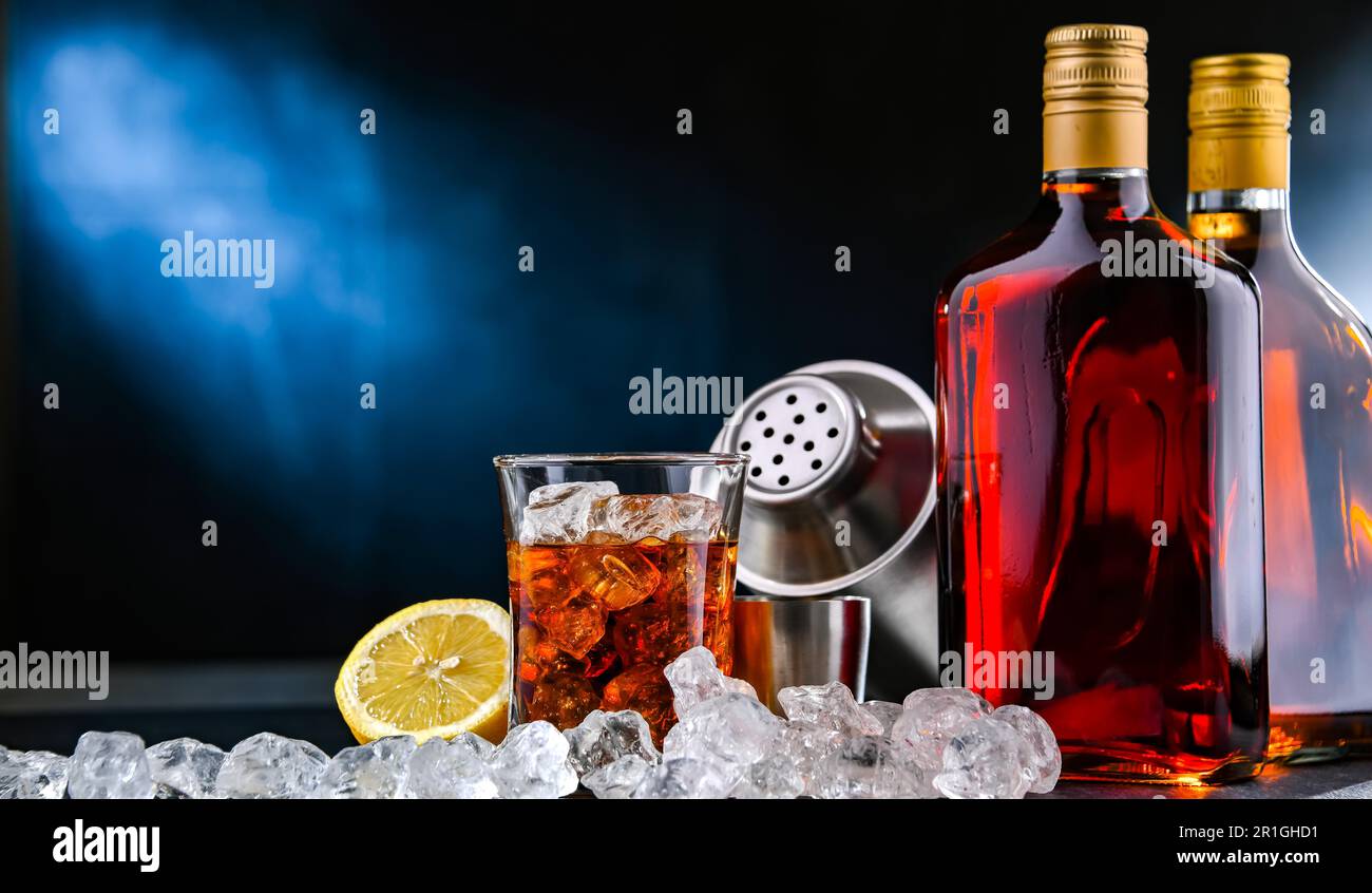 Composition with an alcoholic drink and a cocktail shaker Stock Photo ...