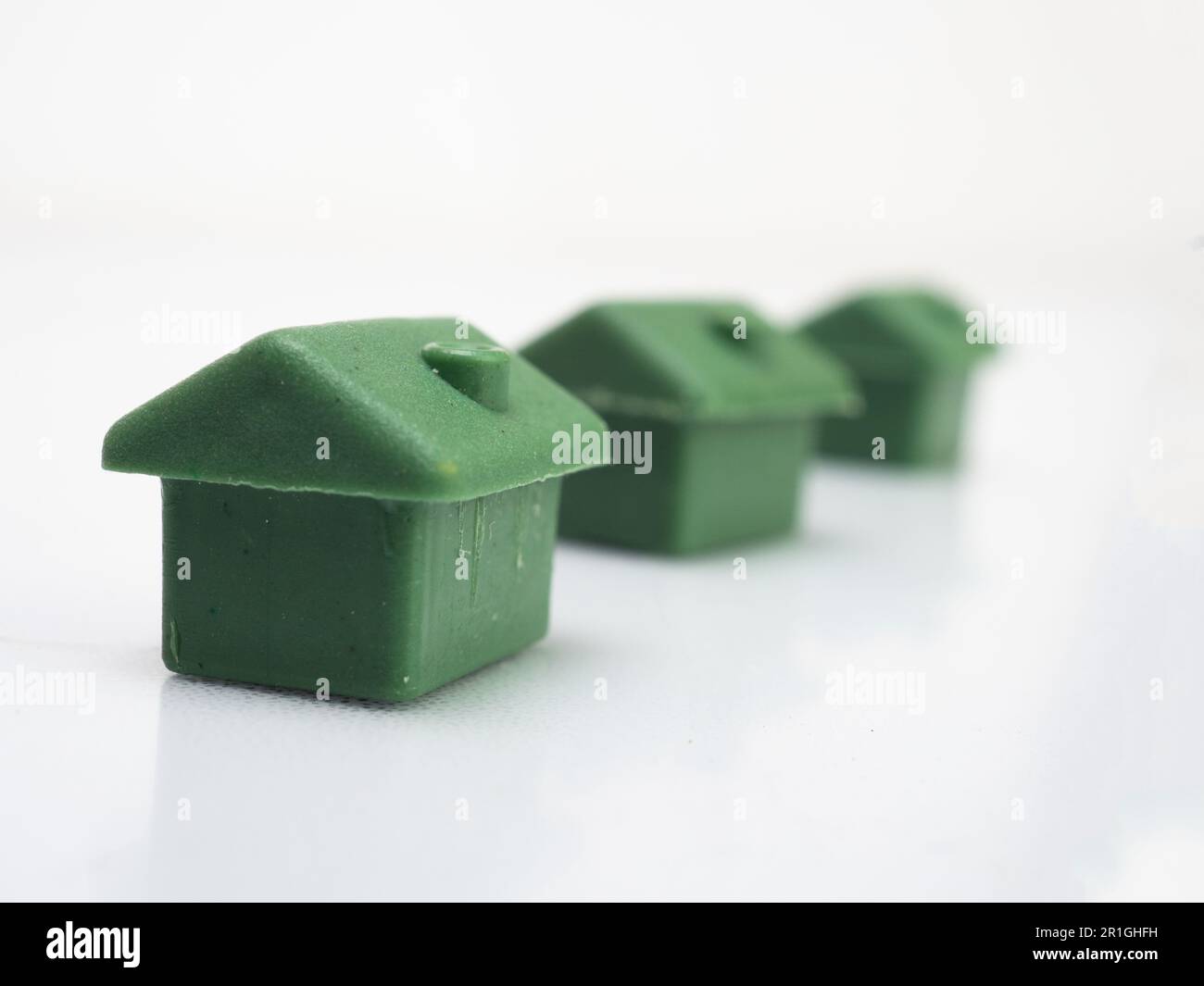 Residental house miniature made from recycled plastic, isolated on a ...