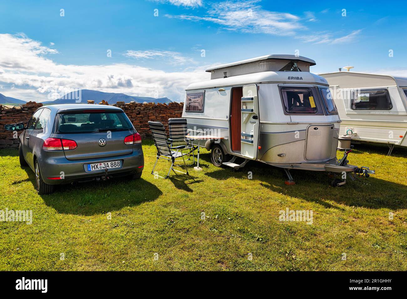 Car with Eriba Touring, pop-up roof caravan, cult, retro, on campsite ...