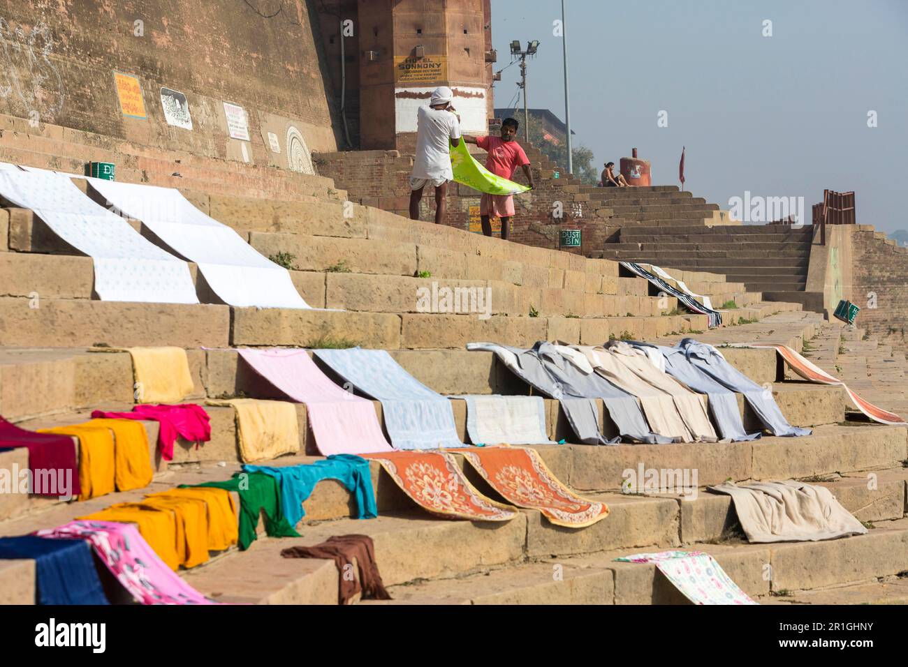 Laundry drying on the stone steps by the holy river Ganges, Varanasi ...