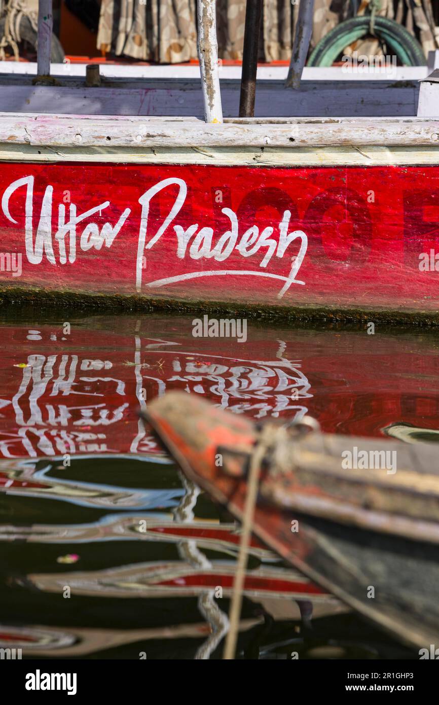 Old wooden boat with the inscription of the state of Uttar Pradesh ...