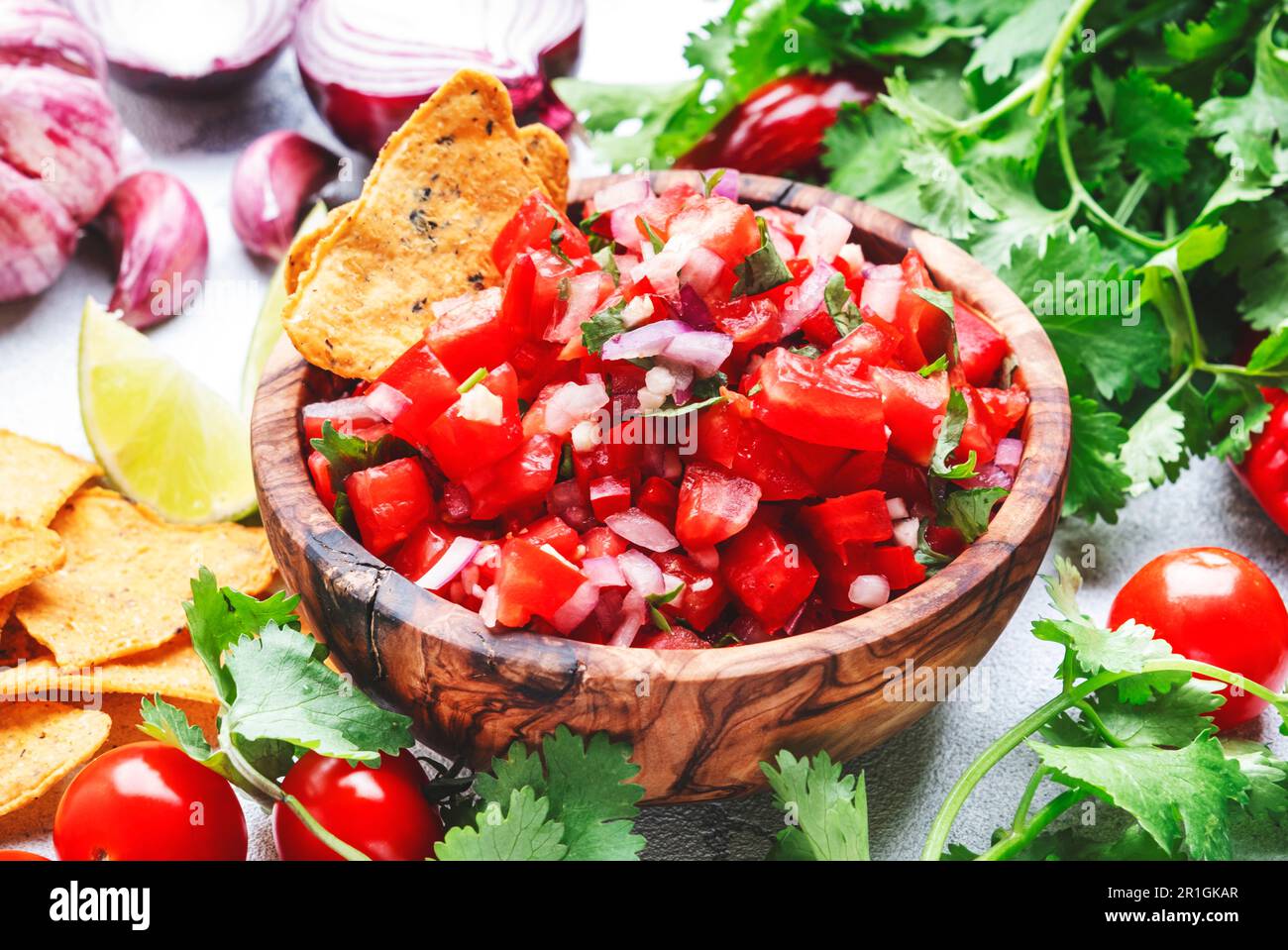 Salsa sauce with tomatoes, chili peppers, onion, garlic and cilantro ...