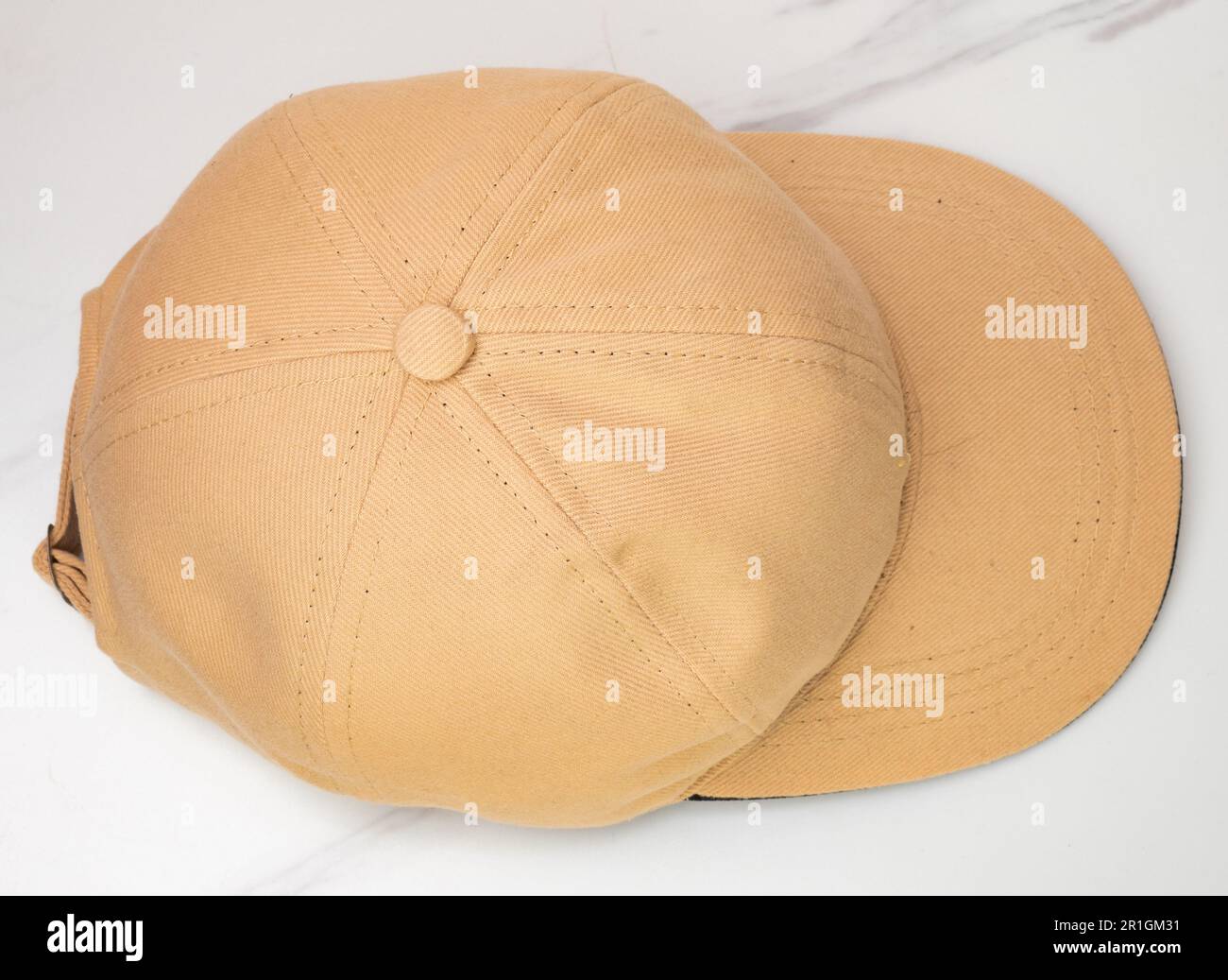 Top view of a brown baseball hat on a white background Stock Photo - Alamy