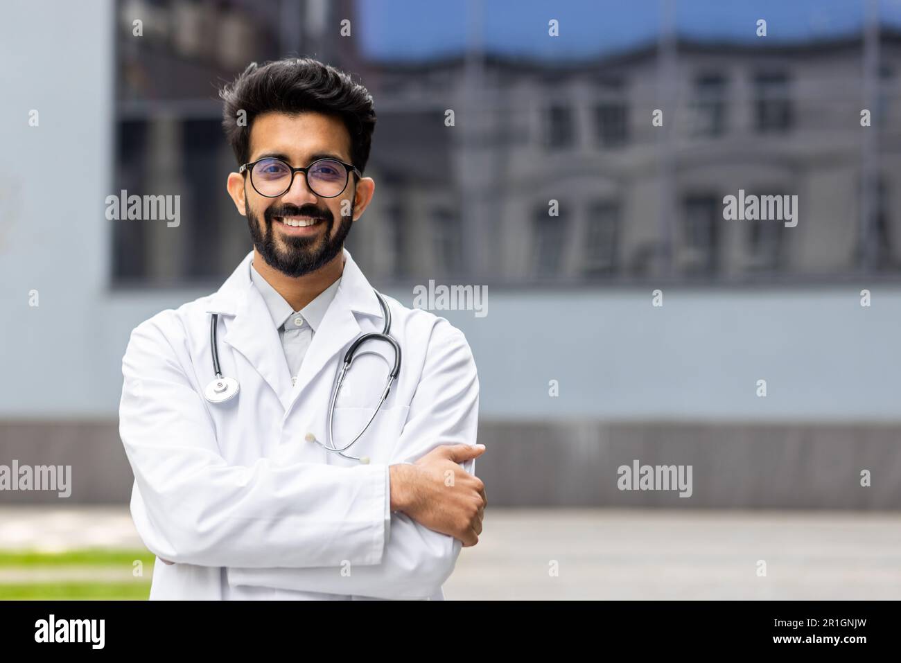 Happy indian doctor cardiologist man hi-res stock photography and ...