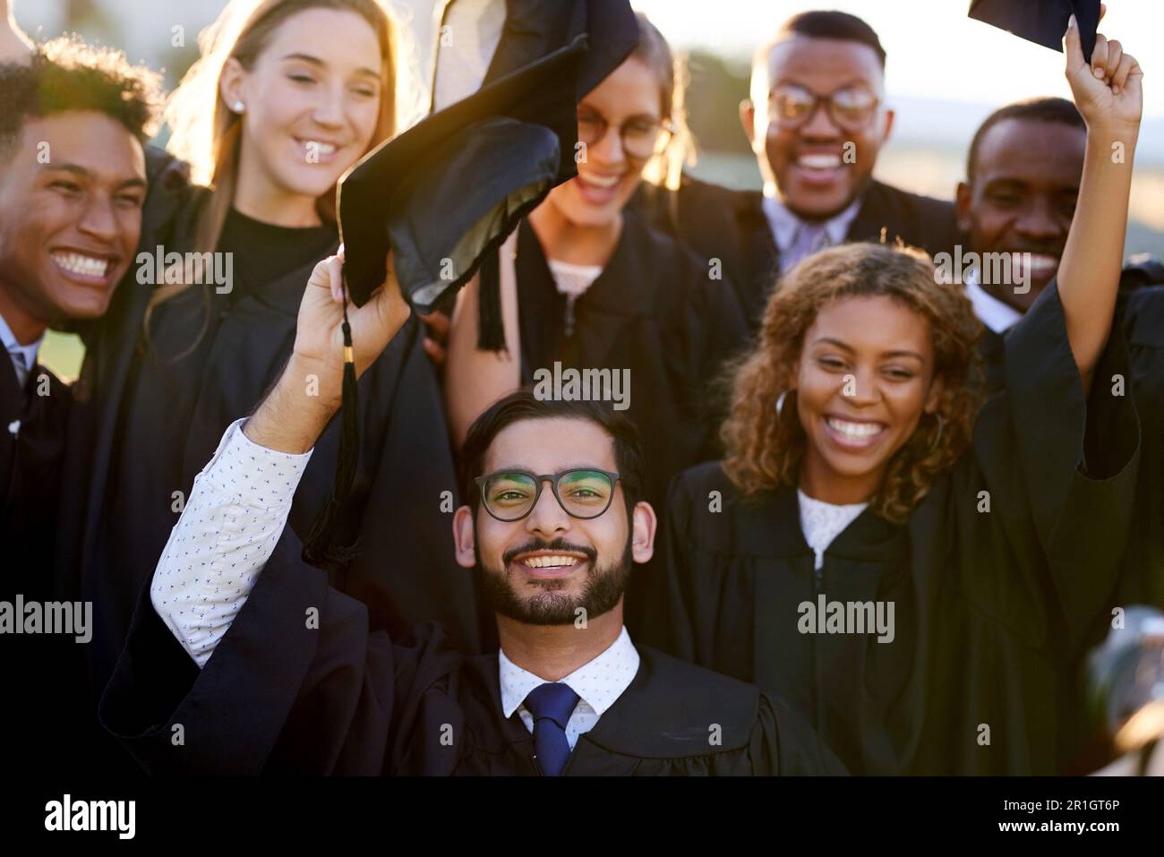 Its a day full of celebrations. Portrait of a group of university ...