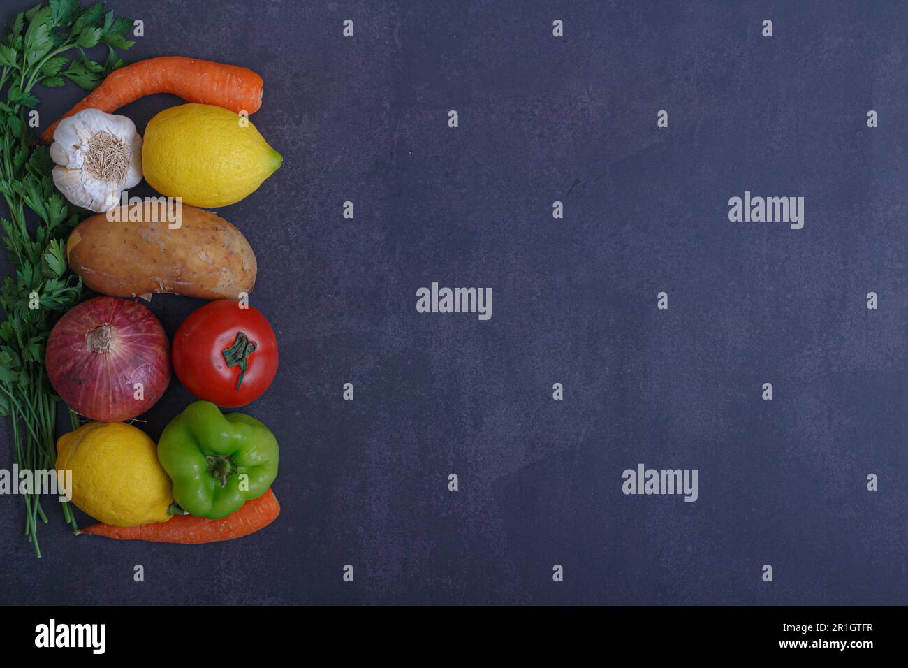 Organic food background. Food photography with different fruits on dark ...