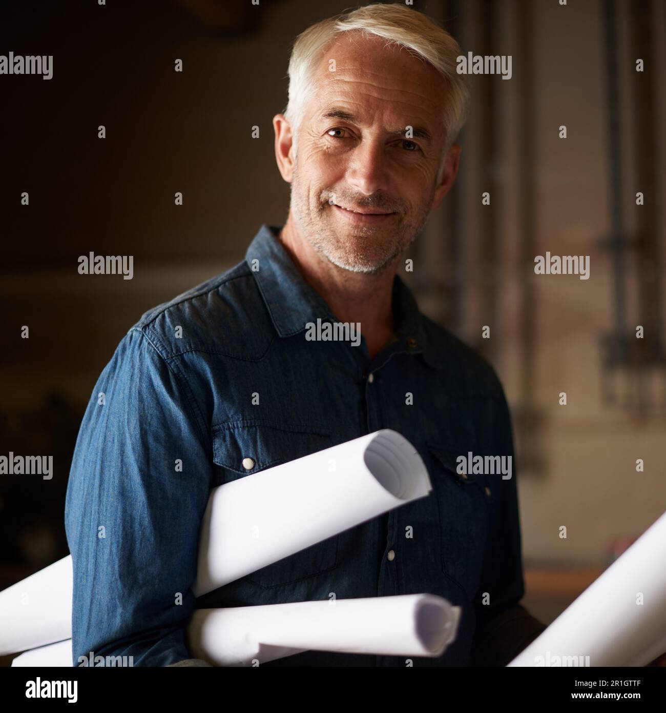 Senior architect, blueprint and man with smile in portrait, renovation ...