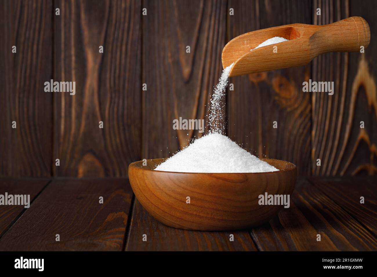 Sugar spilling from spoon hi-res stock photography and images - Alamy