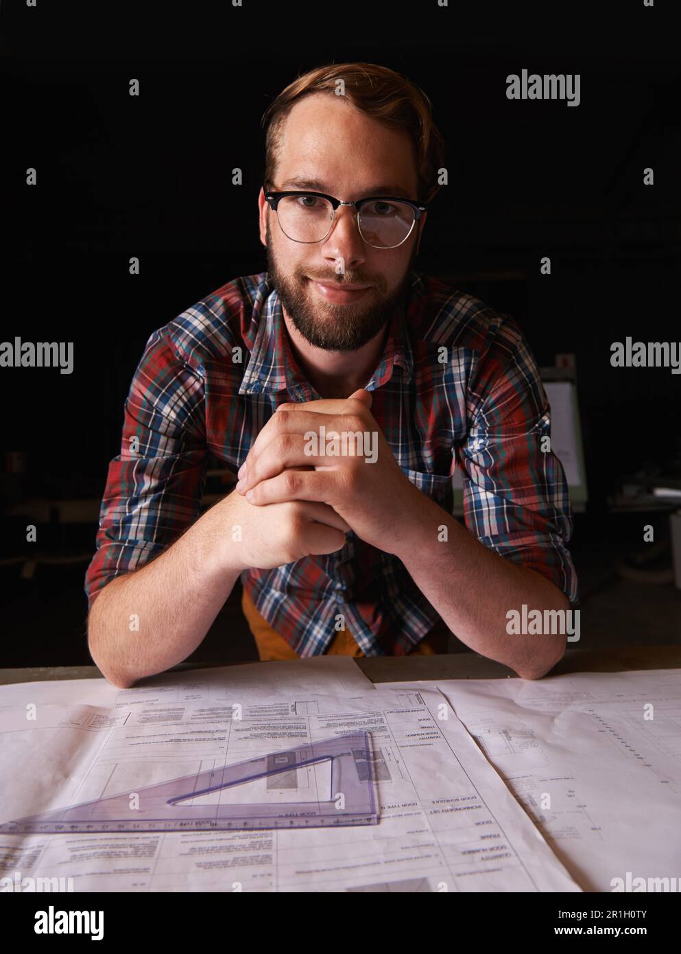 Man, architect in portrait with blueprint in workshop and professional ...
