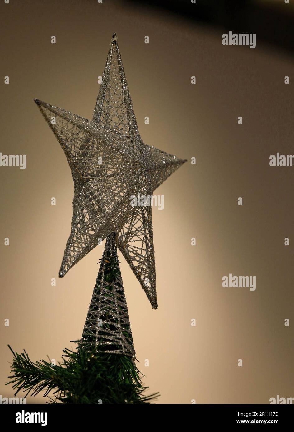 Silver stars decorate, metal stars hanging on thread collection, dark ...