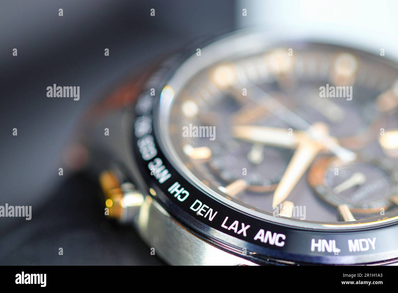close up shallow focus Time zone cities code on luxury world time watch ...