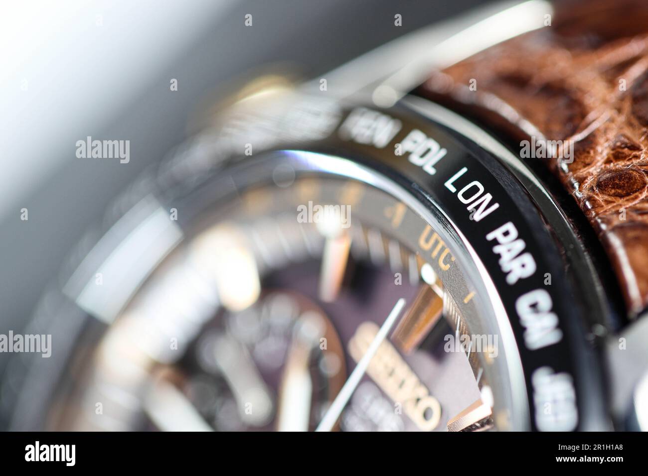 close up shallow focus Time zone cities code on luxury world time watch ...