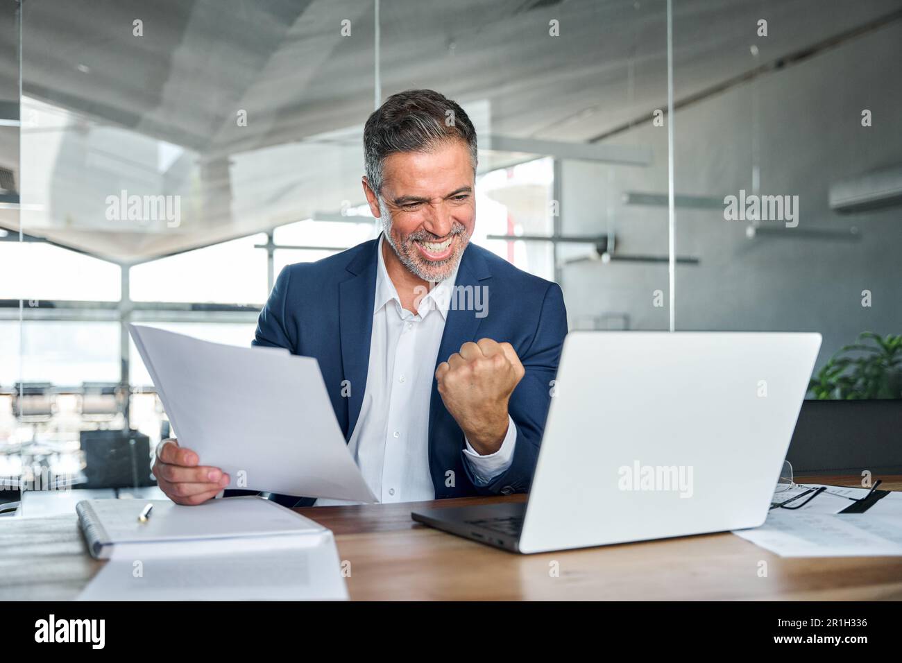 Happy mature older business man ceo wearing suit celebrating success at ...