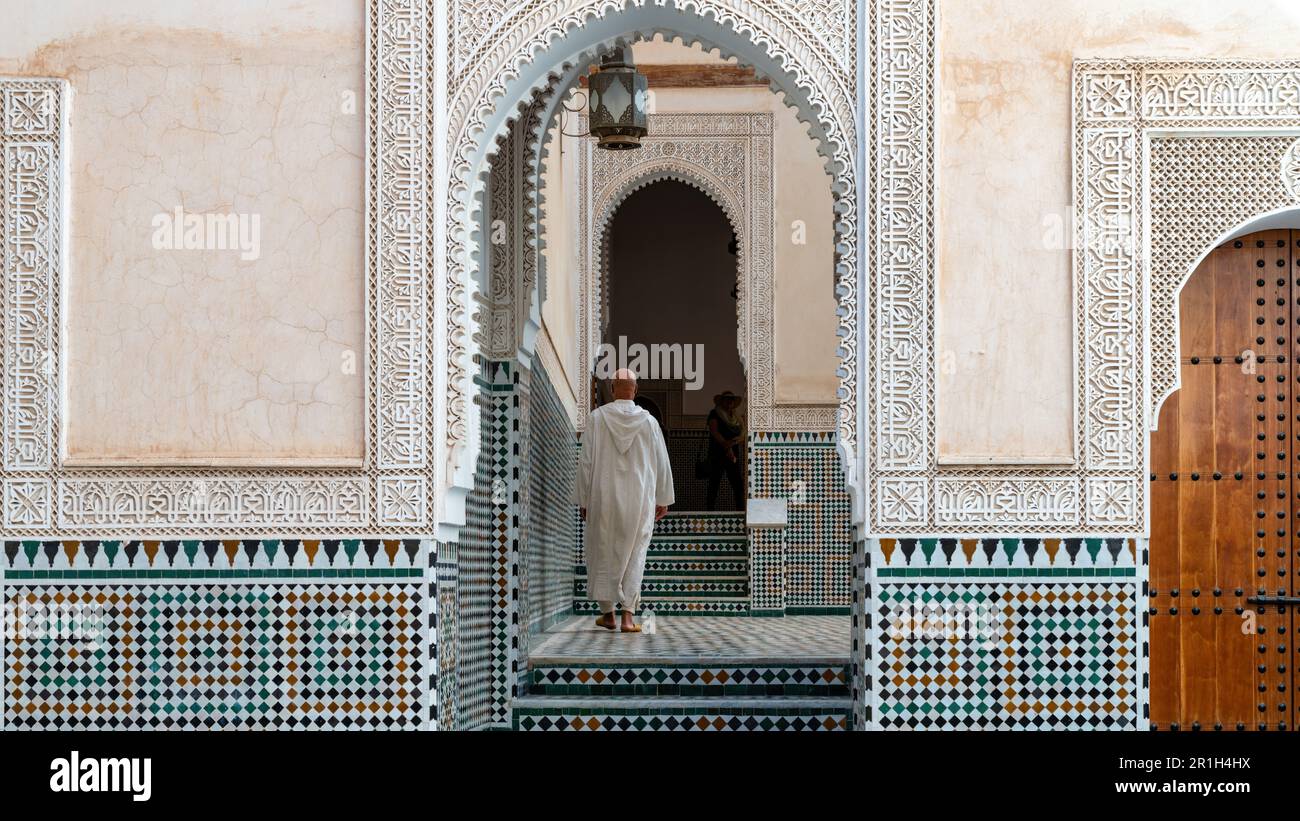 Meknes, Morocco - September 2022: Moroccan man walking inside mausoleum ...