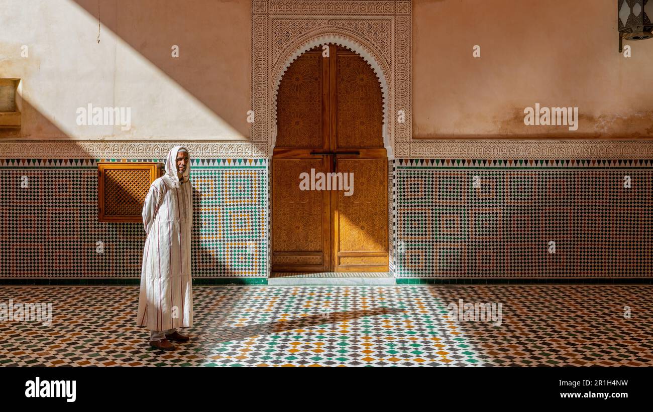 Meknes, Morocco - September 2022: Moroccan man walking inside mausoleum ...