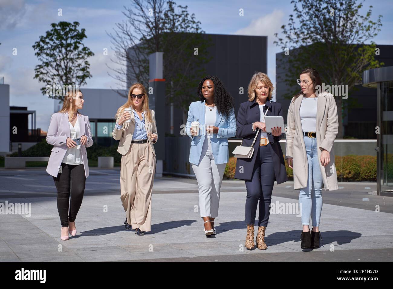 Successful Businesswomen Having a Productive Conversation While Walking ...