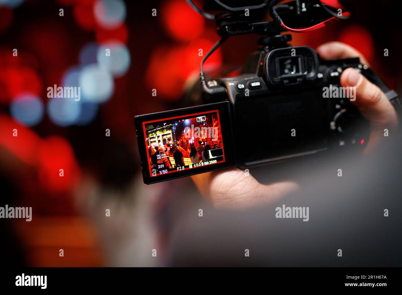 Party footage filmed using a rotating screen camera Stock Photo - Alamy