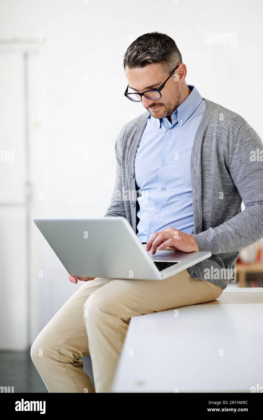 Young diligent employee glasses hi-res stock photography and images - Alamy