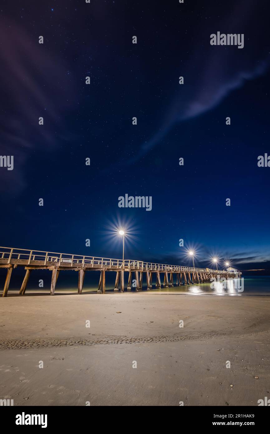 Henley Beach Jetty illuminated at night with a starry sky above, South ...
