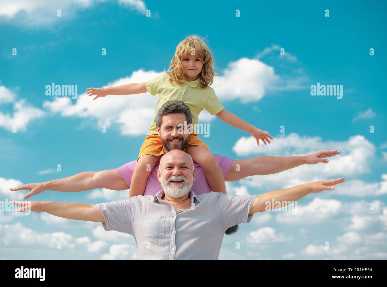 Family meeting. Father and a boy came to see his grandfather raising ...