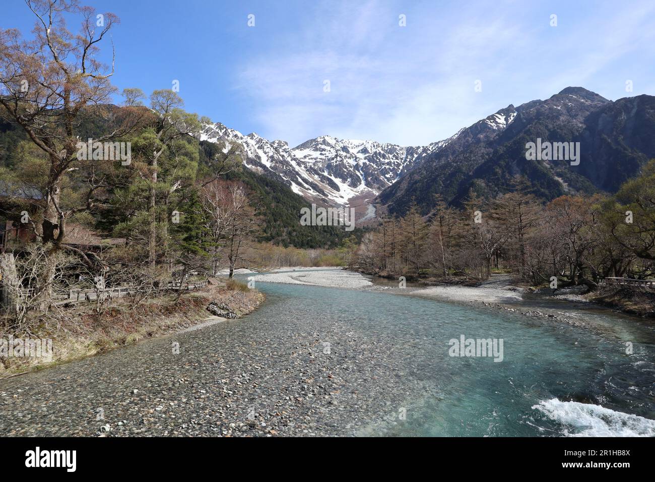 The clear Azusa River and snow-capped Mount Hotaka viewed from Kappa ...