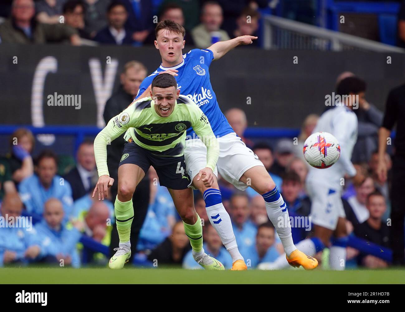 Manchester City's Phil Foden (left) and Everton's Nathan Patterson ...