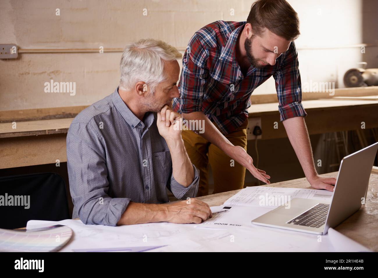 Architecture, collaboration and father and son with blueprint in ...