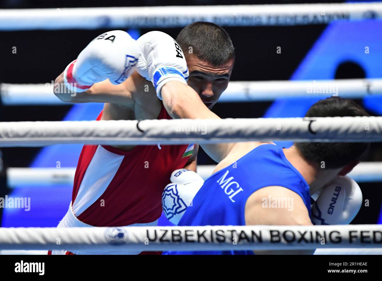 Uzbekistan's Ruslan Abdullaev, red, fights with Mongolia's Baatarsukh Chinzorig during the men's ...