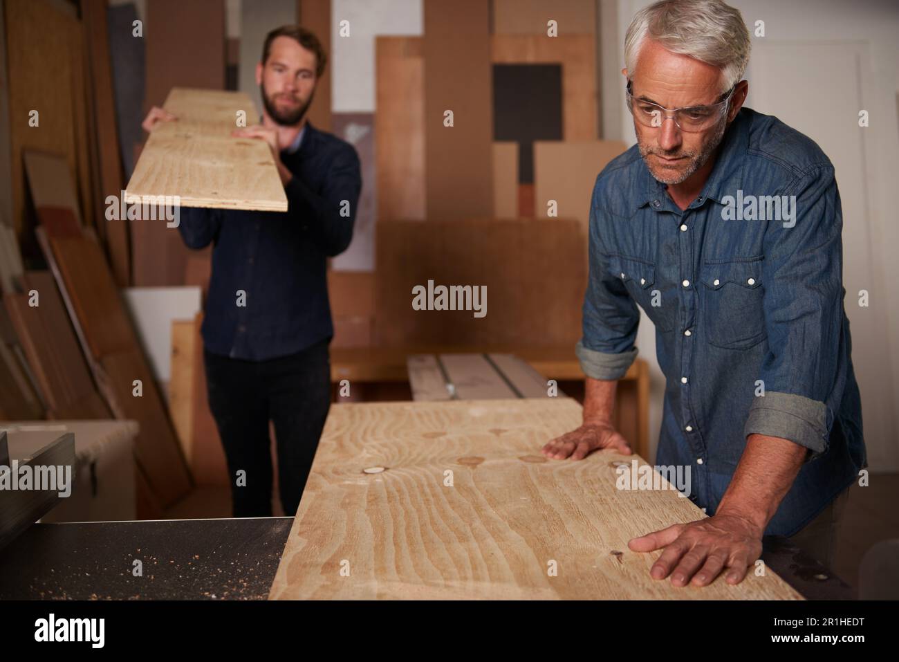 Carpentry, carpenter and men in team in workshop, design project with ...