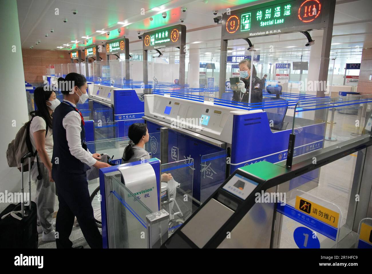 YANTAI, CHINA - MAY 14, 2023 - Border police check the documents of an ...