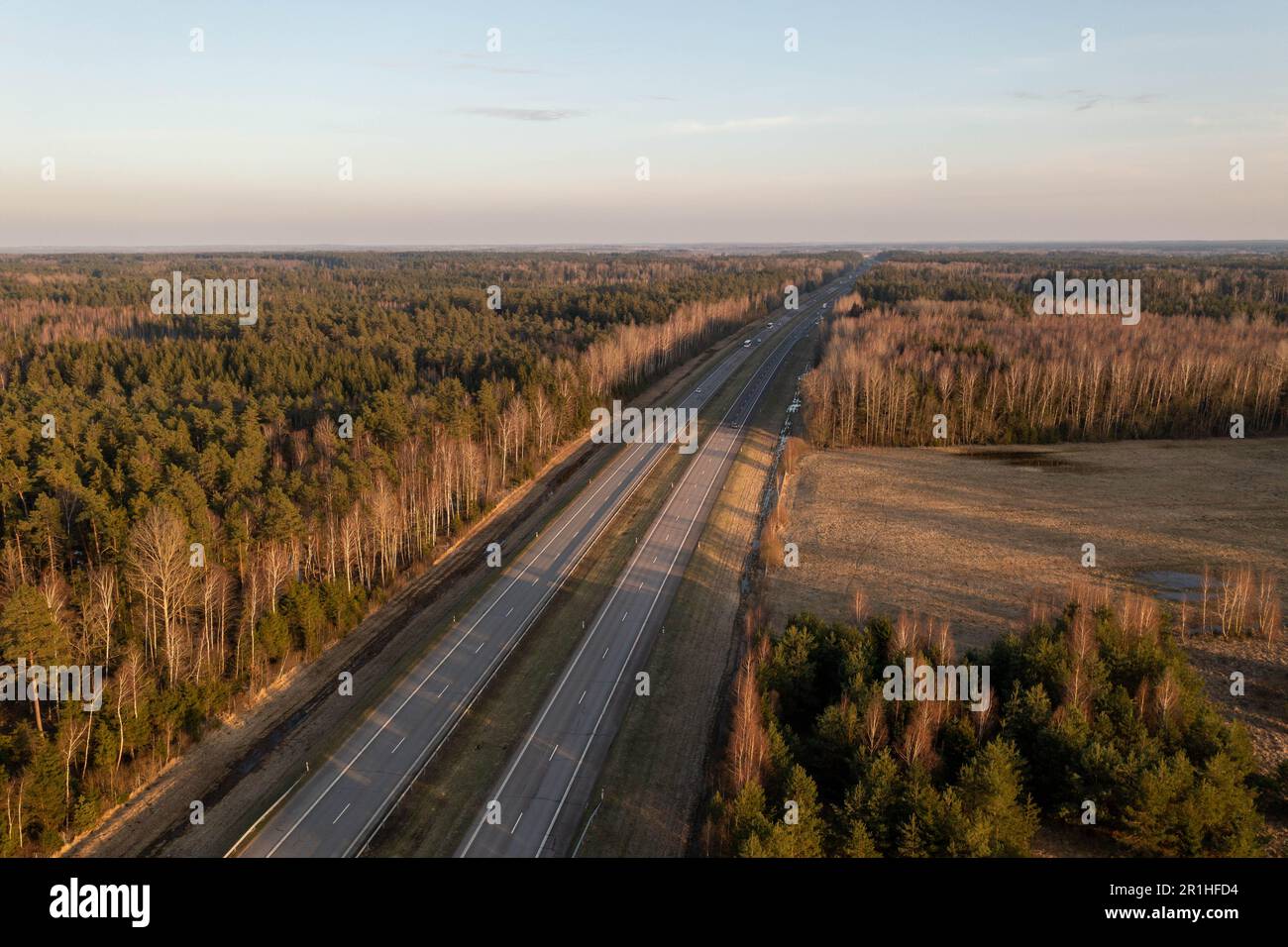 Drone photography of highway surrounded by agriculture fields and ...