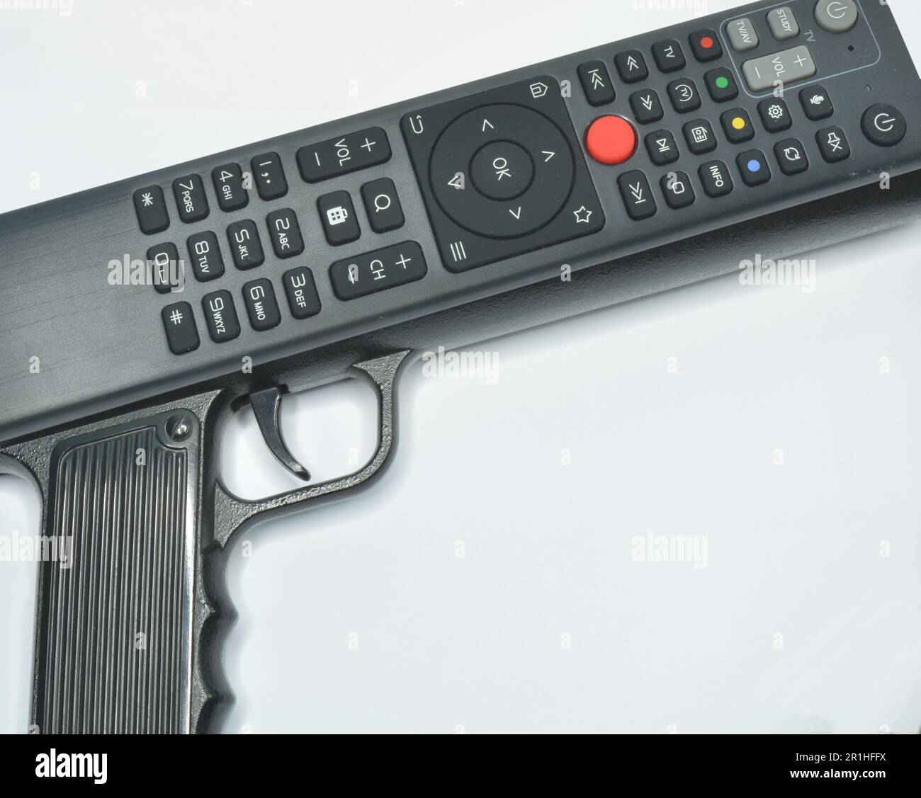 Remote gun - gun handle and remote blended as one Stock Photo - Alamy
