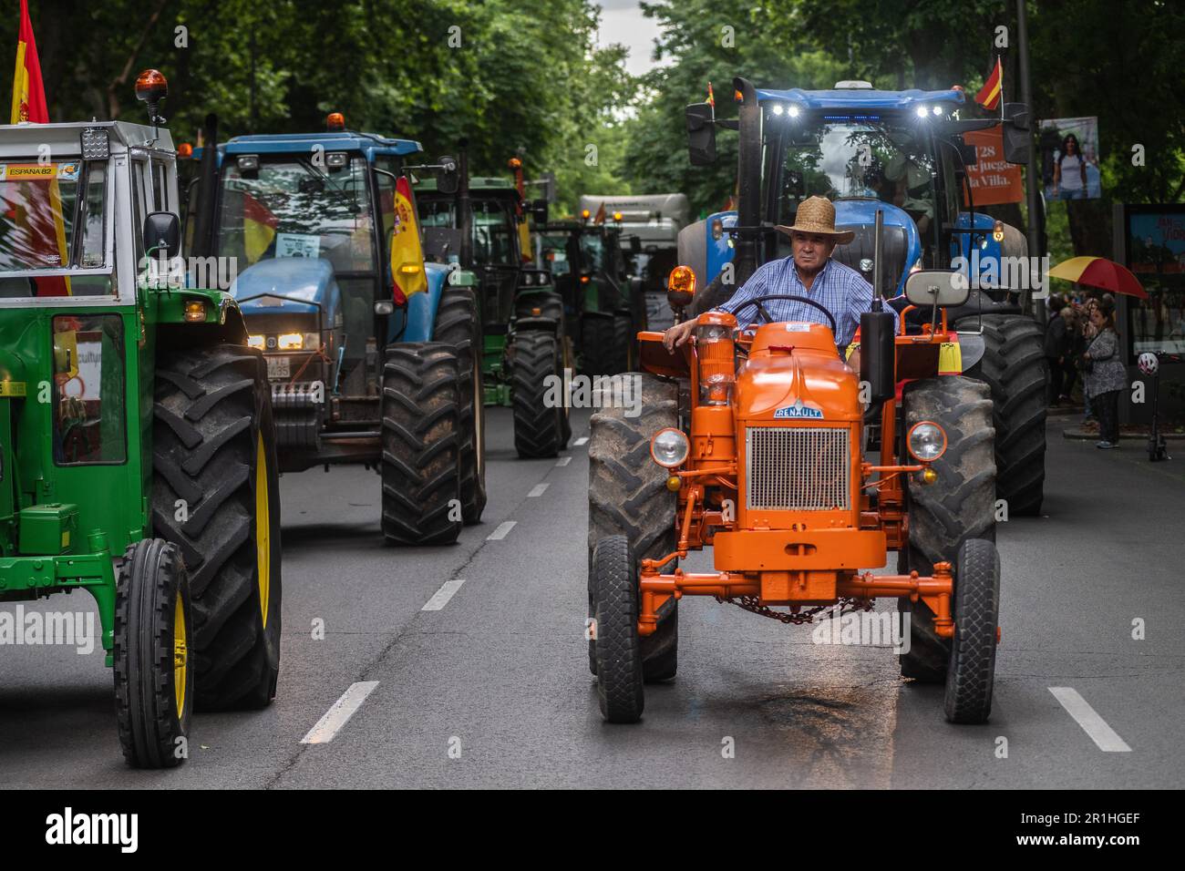 Madrid, Spain. 14th May, 2023. Tractors are seen marching through the ...