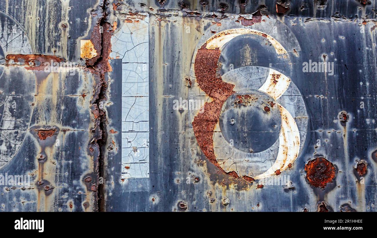 Grunge worn rusty metal background with chipped and faded painted ...