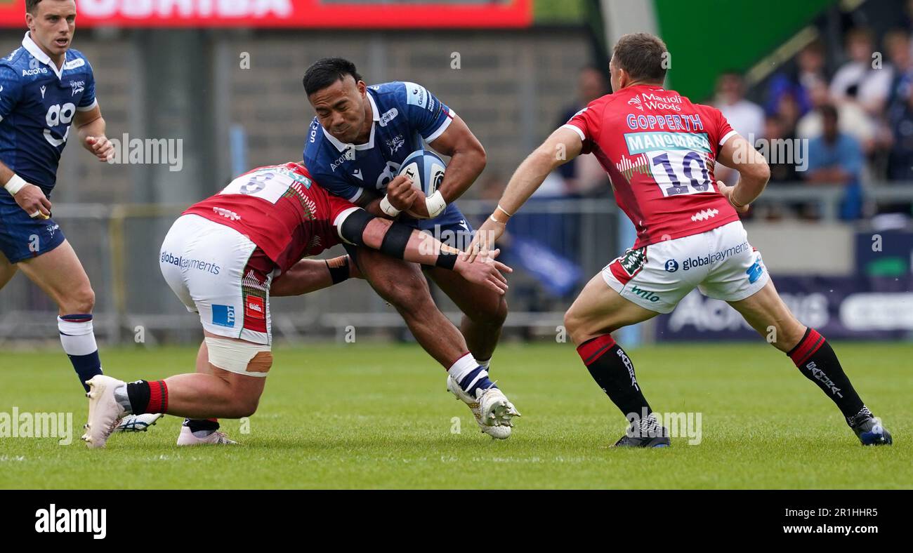 Sale Sharks' Manu Tuilagi is tackled by Leicester Tigers' Jasper Wiese ...
