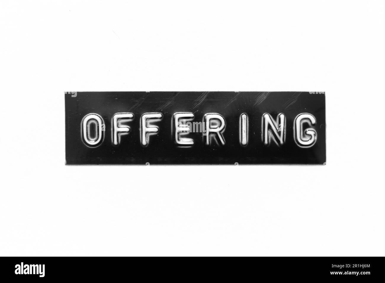 Black color banner that have embossed letter with word offering on ...