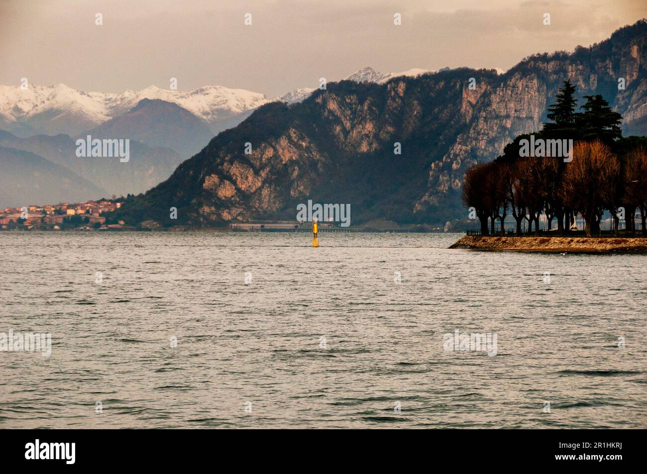 Golden statue of San Nicolò placed in Lake Como in Lecco, Italy Stock ...